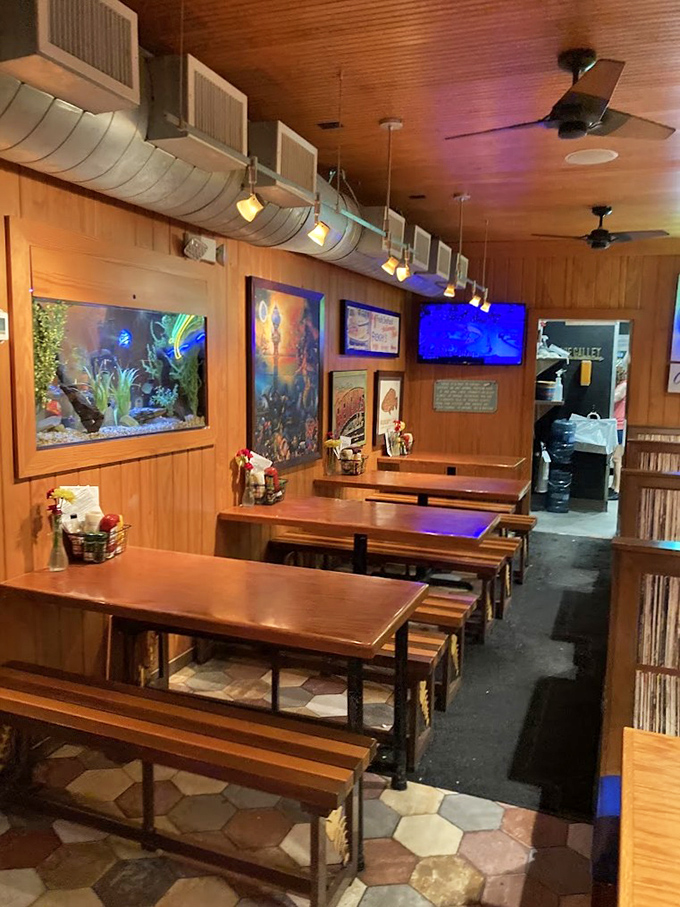 No white tablecloths here&mdash;just wooden benches, fish tanks, and the promise of honest food that doesn't need fancy surroundings to impress.