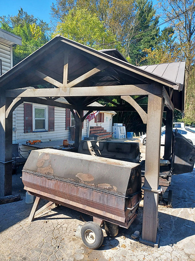 BBQ's backstage area. This workhorse smoker has probably seen more action than a rock star's tour bus, and smells infinitely better.