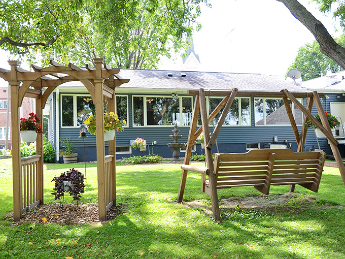 A peaceful garden retreat for post-dinner contemplation, complete with swing. Because food this good deserves a moment of reflection.