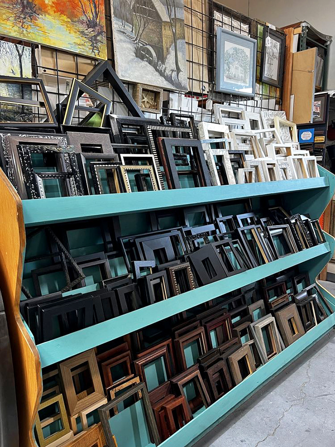 Picture frames await their next chapter, stacked like artistic possibilities ready to showcase new memories.