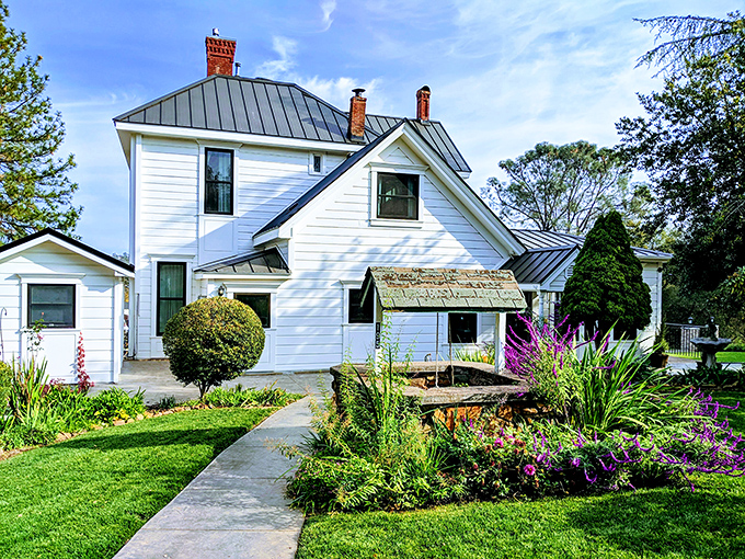 This picture-perfect Victorian home surrounded by gardens embodies affordable California charm. White picket fence dreams are still alive in Auburn.