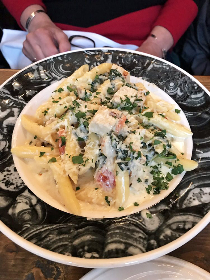 Pasta that doesn't just sit on the plate&mdash;it beckons. Each strand coated in sauce that required someone's grandmother's approval.