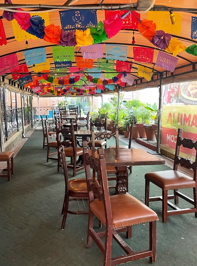 Dining under a canopy of colorful papel picado feels like eating inside a perpetual fiesta&mdash;no special occasion required.
