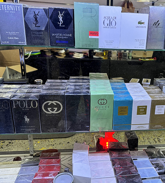 Designer fragrances lined up like soldiers, ready to march home with shoppers who'd never dream of paying department store prices.