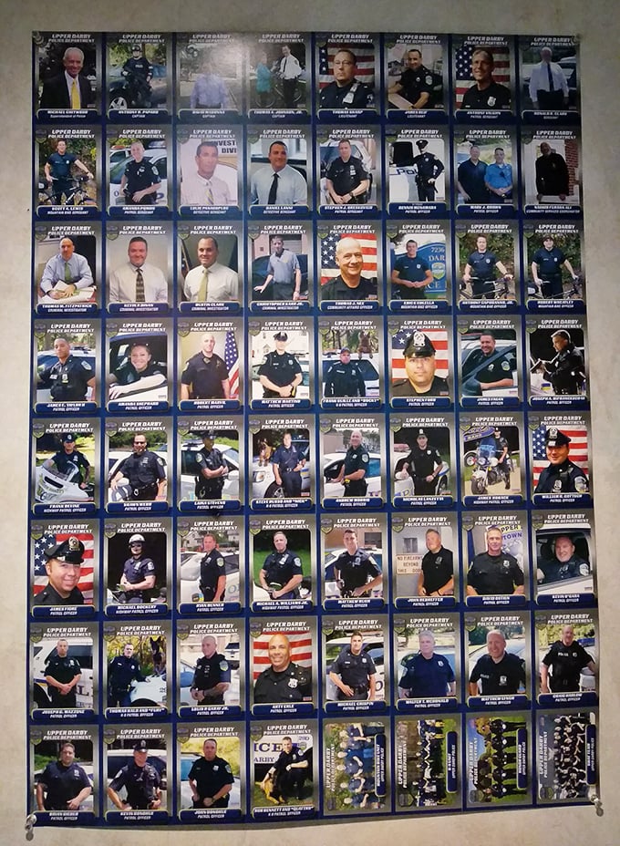 A wall of local heroes shows this isn't just a restaurant—it's a community cornerstone that honors those who serve.