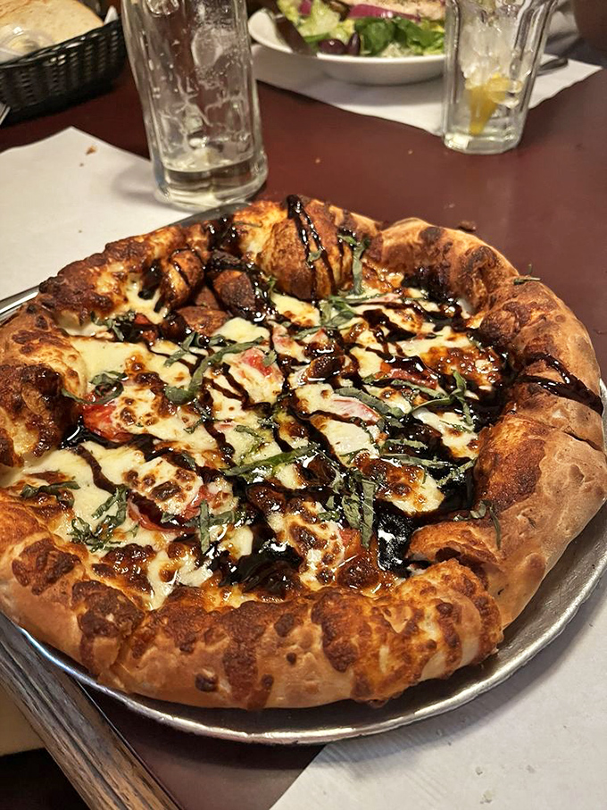 This isn't just pizza&mdash;it's a masterpiece of bubbled crust, melted cheese, and balsamic drizzle that makes sharing feel like a genuine sacrifice.