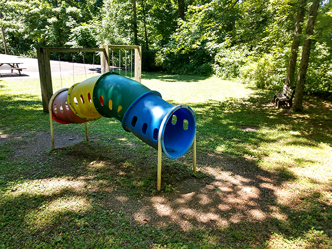 The playground tunnel&mdash;where kids burn energy and parents get five blessed minutes of peace. Engineering at its most practical.