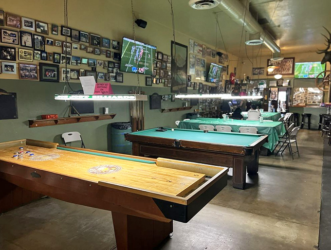 The pool tables stand ready for action under the watchful gaze of countless photographs&mdash;silent witnesses to decades of friendly competition and cold beer.