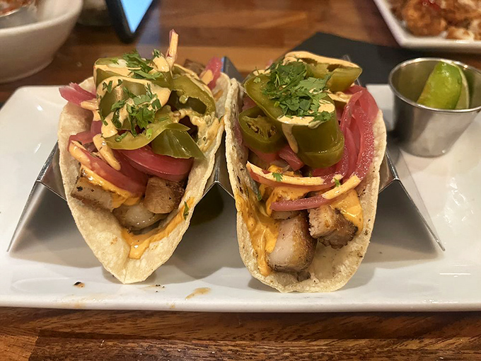 These tacos aren't just filled&mdash;they're architectural wonders balancing meat, acid, and heat with artistic precision. 