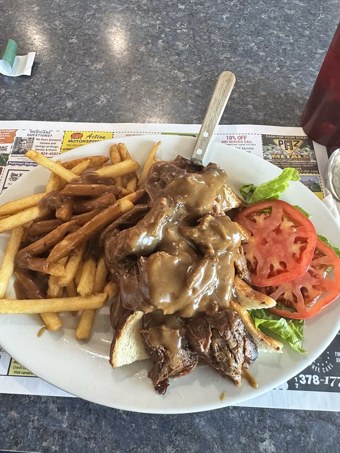 Hot roast beef that's been simmering since yesterday, smothered in gravy that should be bottled and sold as liquid happiness.