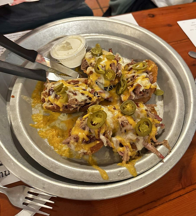 Loaded potato skins that don't skimp on the good stuff—melty cheese, jalapeños, and pulled pork in perfect harmony.