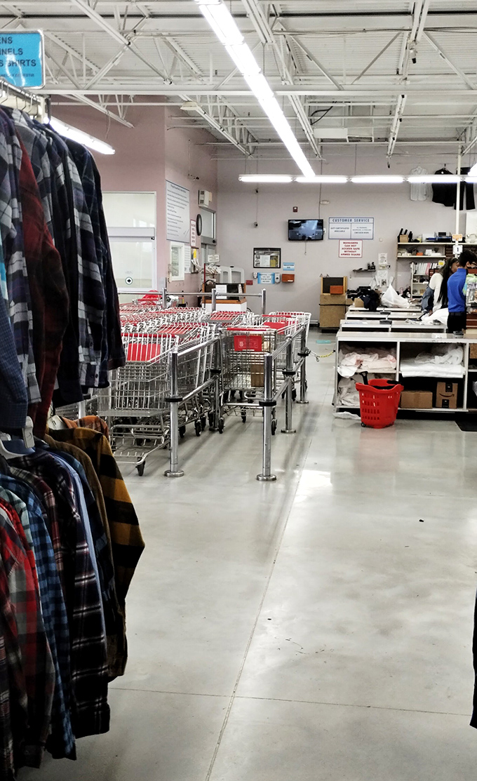 Where shopping carts go to rest between adventures. The checkout area: final gateway between bargain hunting and victory.