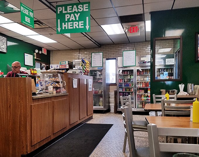 The "Please Pay Here" sign might as well read "This is where you'll be shocked by how little you're paying for food this good."