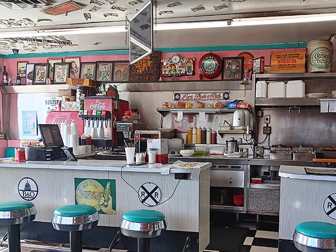 The counter seating isn't just functional—it's front-row tickets to the short-order ballet, where cooks orchestrate multiple orders without missing a beat.