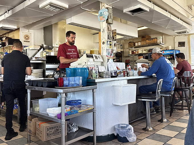 The heart of operations, where orders are called, jokes are exchanged, and regulars are greeted by name.