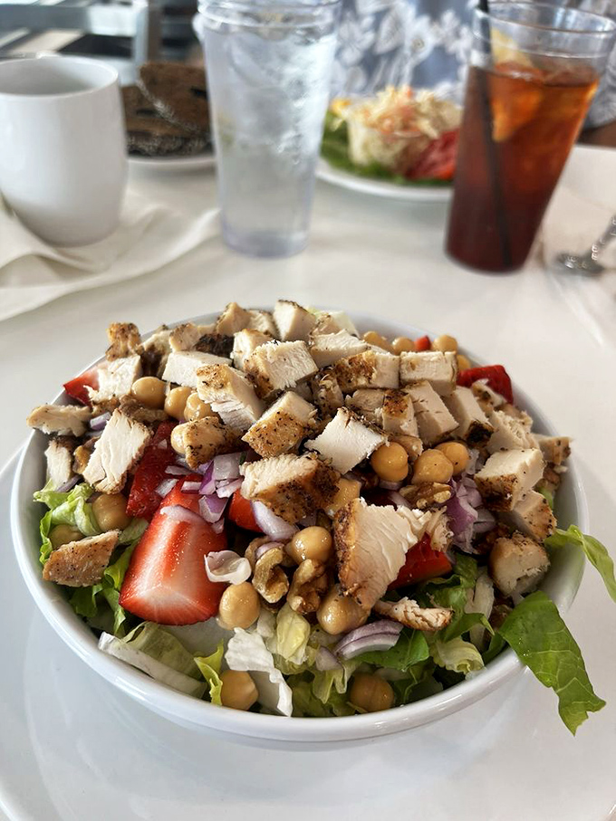 A salad that doesn't feel like punishment&mdash;fresh greens, grilled chicken, strawberries, and chickpeas creating a chorus of flavors that might make you forget bacon exists.