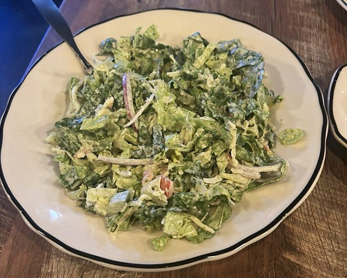 A salad that doesn't apologize for being a salad. Fresh, vibrant, and proving that seafood restaurants can nail the green stuff too.