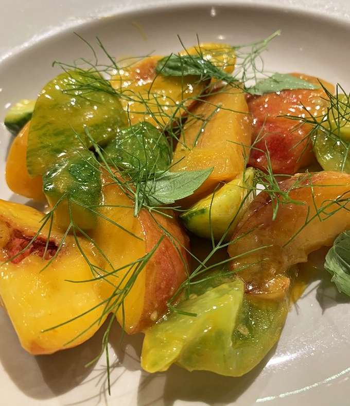 A salad that proves vegetables can be the main event &ndash; vibrant heirloom tomatoes and herbs that taste like summer sunshine.