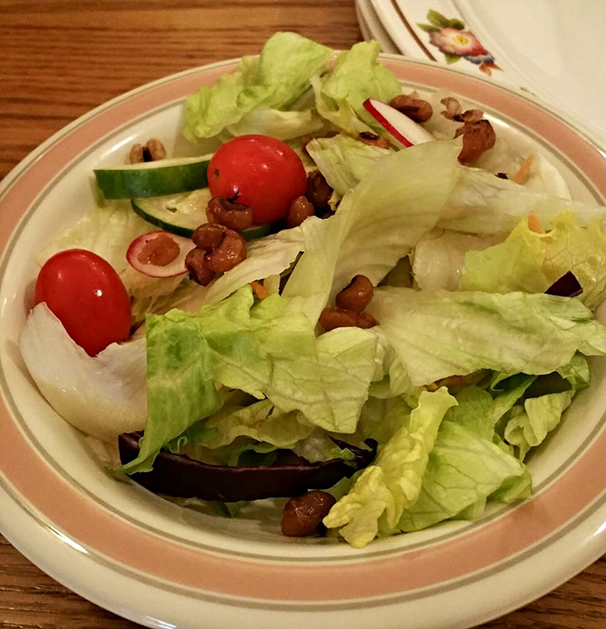A simple salad that politely says, "I'm here if you need to feel virtuous between biscuit refills."