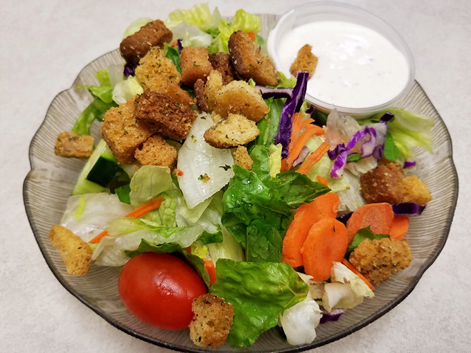 A garden party in a bowl where crisp vegetables, crunchy croutons, and creamy dressing come together for a refreshing dance of textures.