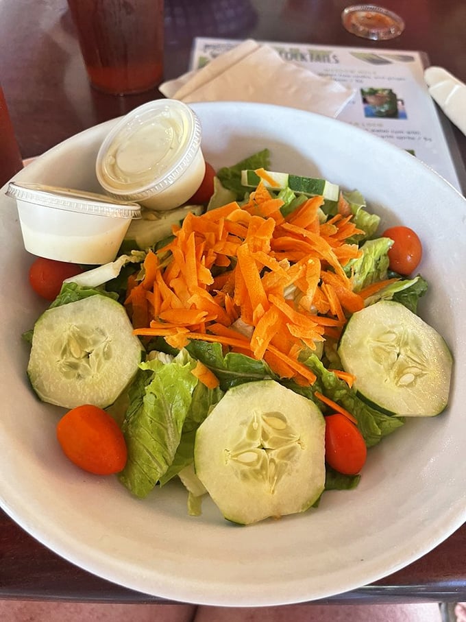 A salad that doesn't apologize for being a salad&mdash;bright, crisp, and ready to balance out whatever fried goodness you've been enjoying. Virtue in a bowl.