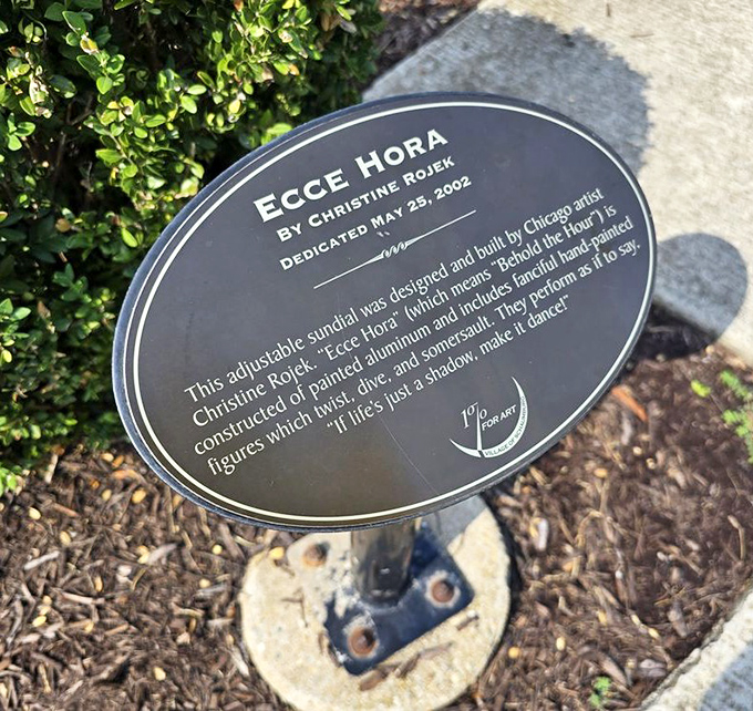 "Ecce Hora" plaque reveals the story behind the art. Each sculpture in the park has its own fascinating origin tale.