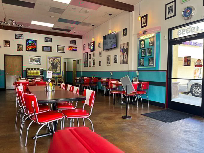 Classic diner seating arranged like a mid-century social experiment: how many strangers can become friends over burgers and conversation?