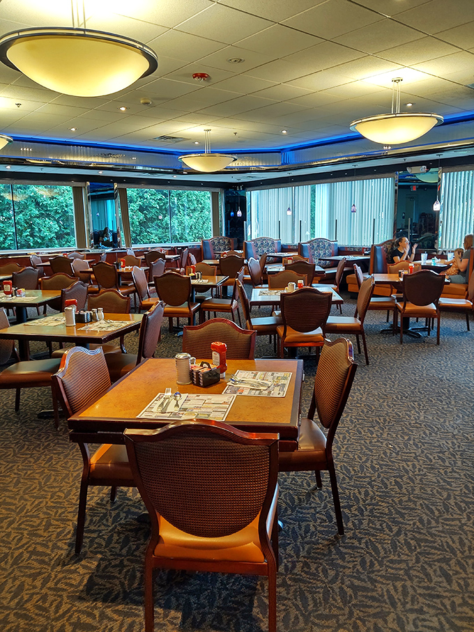 The dining room's warm lighting and comfortable seating invite you to linger over that second cup of coffee or third bite of pie.