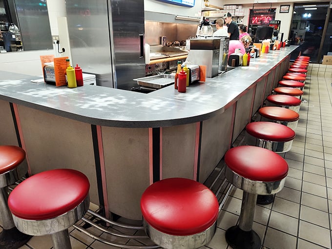 Red stools lined up like patient soldiers, ready to support generations of hungry Missourians in their quest for comfort food.