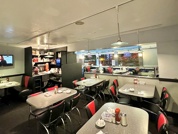 Classic chrome and vinyl seating area where countless cups of coffee have fueled conversations both profound and delightfully mundane.