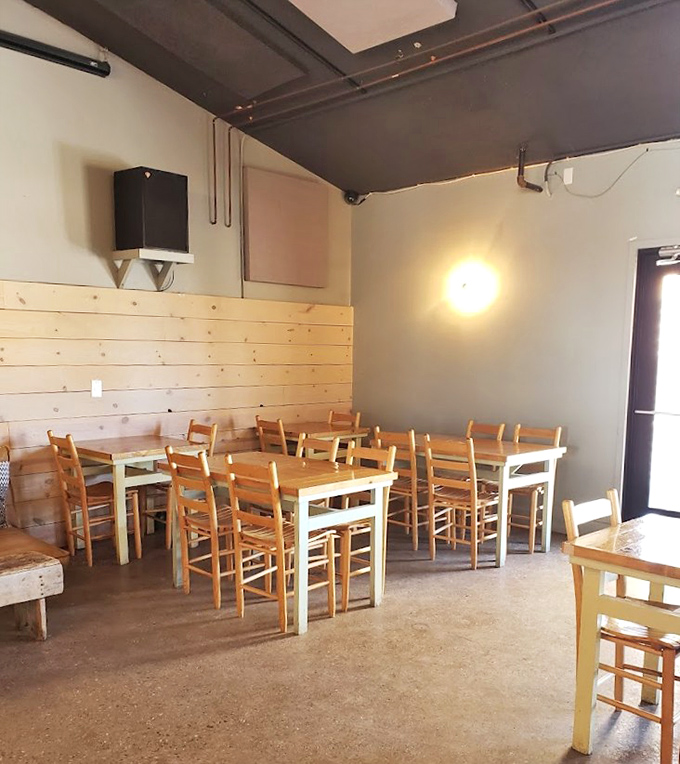 Simple wooden tables and chairs create an unpretentious backdrop for extraordinary food. Sometimes the best dining rooms have concrete floors and honest intentions.