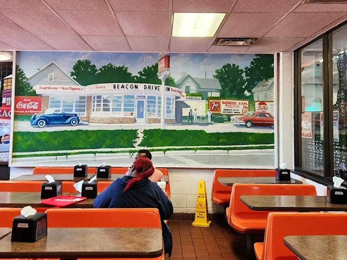 That mural isn't just decoration&mdash;it's a time machine to The Beacon's early days, when cars had fins and milkshakes cost a quarter.