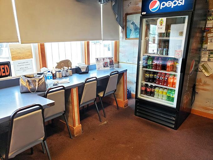 Simple tables, practical chairs, and a cold drink cooler&mdash;because when the food is this good, you don't need fancy furniture.