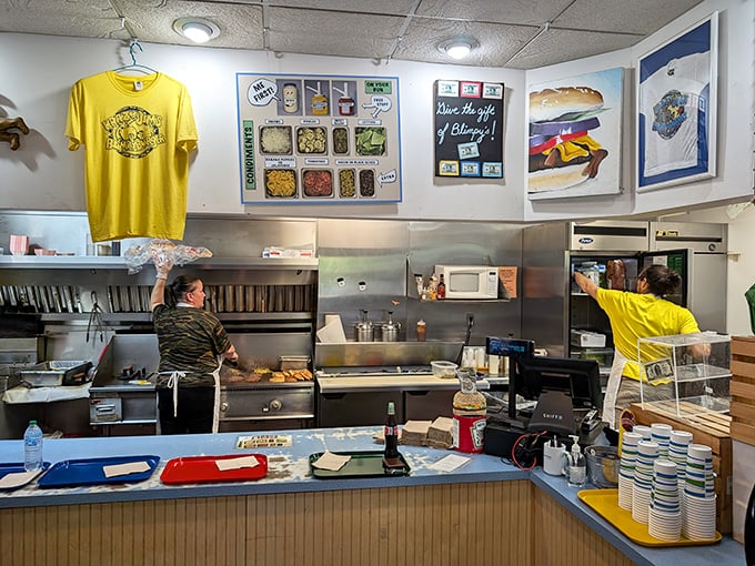 The heart of the operation &ndash; where burger magic happens in full view. No secrets here, just time-honored techniques and practiced hands.