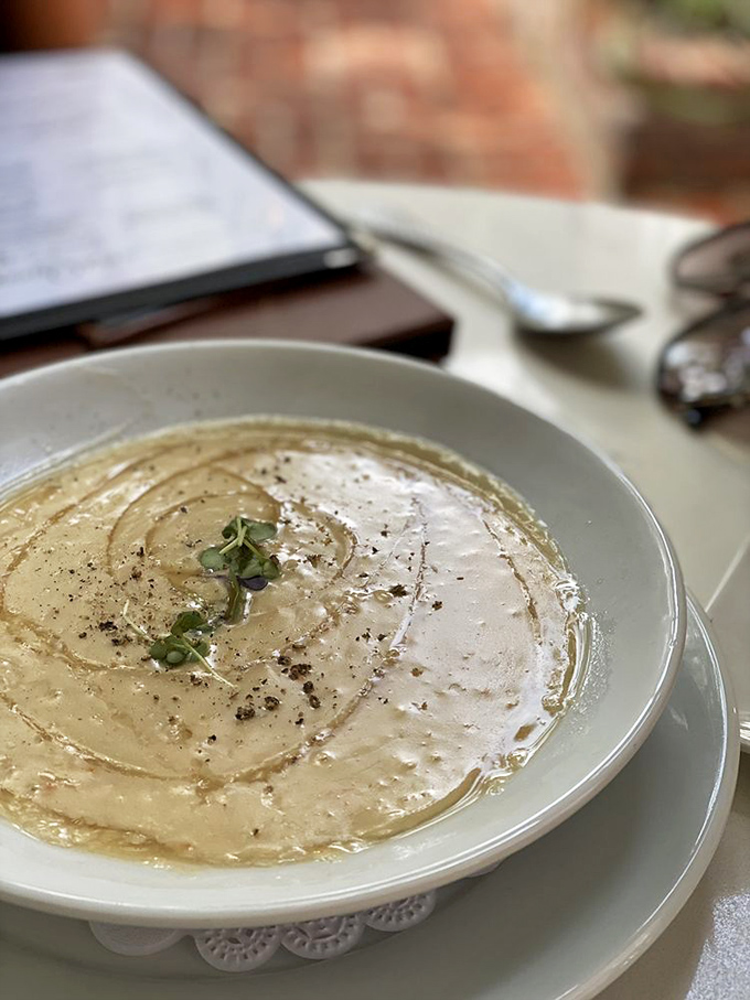 She-crab soup so velvety and rich, it's basically wearing pearls&mdash;a creamy celebration of Charleston's coastal bounty.