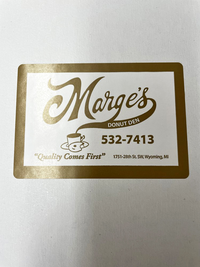 A golden business card that might as well be a ticket to flavor paradise at 1751 28th Street SW.