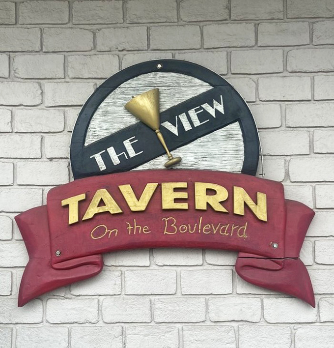 The View Tavern's iconic sign promises two things: a martini glass aesthetic and the comfortable reliability of a neighborhood institution.