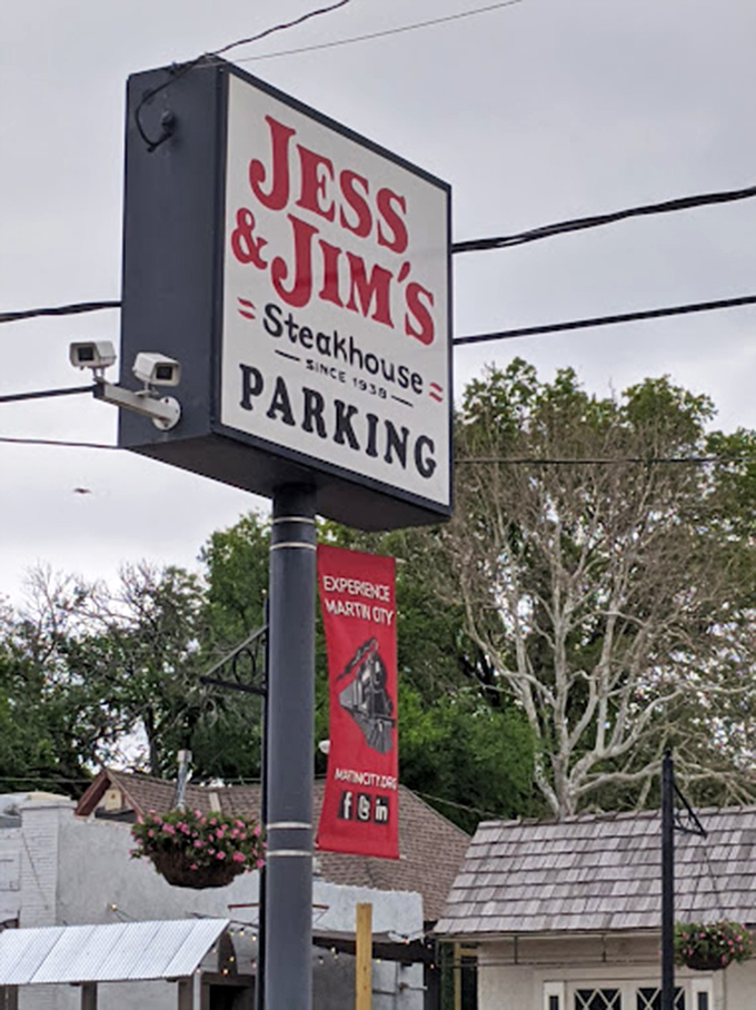 The parking sign stands tall, a landmark for hungry travelers seeking beef nirvana in Martin City's culinary landscape.