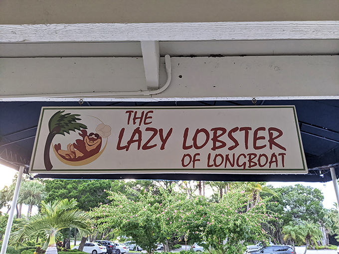 The sign says it all&mdash;a cartoon crustacean lounging in a hammock, living its best life just like you're about to.