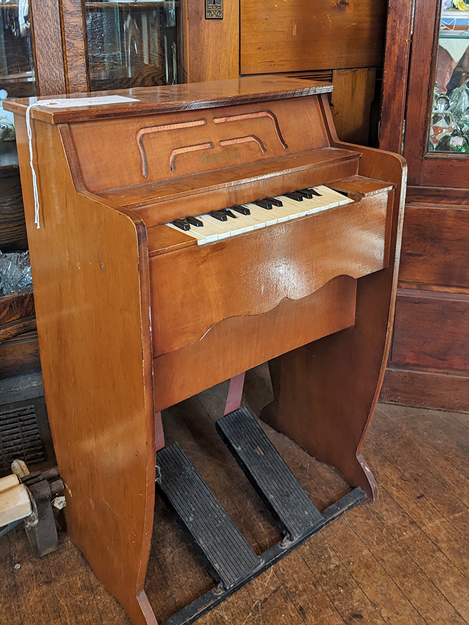 Keys to the past! This charming vintage piano is just waiting for someone to play "Heart and Soul" while their shopping companion rolls their eyes.