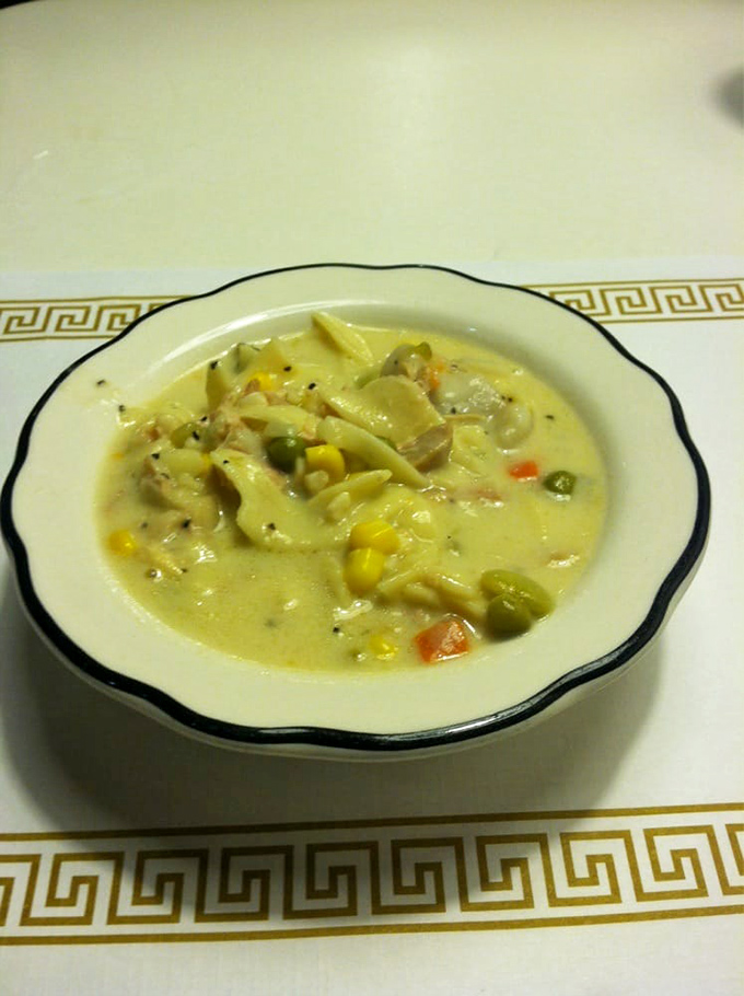 Creamy chicken and vegetable soup that makes you wonder if someone's grandmother is hiding in the kitchen with her secret recipe.