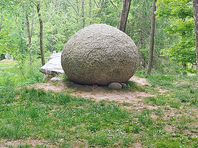 This perfectly round boulder seems to defy gravity and logic. Nature's sculpture or evidence of ancient engineering? Either way, it's utterly captivating.