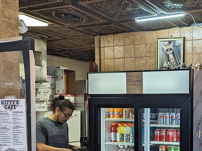 Focused preparation in progress. When someone wears a Missouri State shirt while making your lunch, you know it's authentically local.