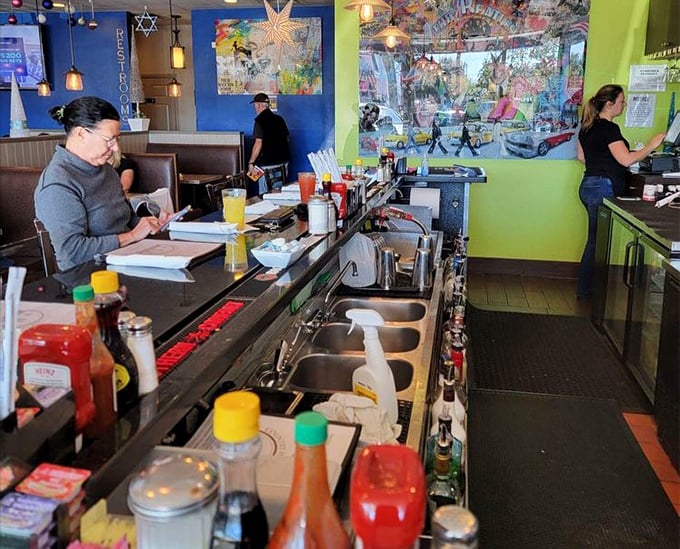 Where breakfast magic happens—the counter offers front-row seats to the morning symphony of sizzling bacon and whisking eggs.