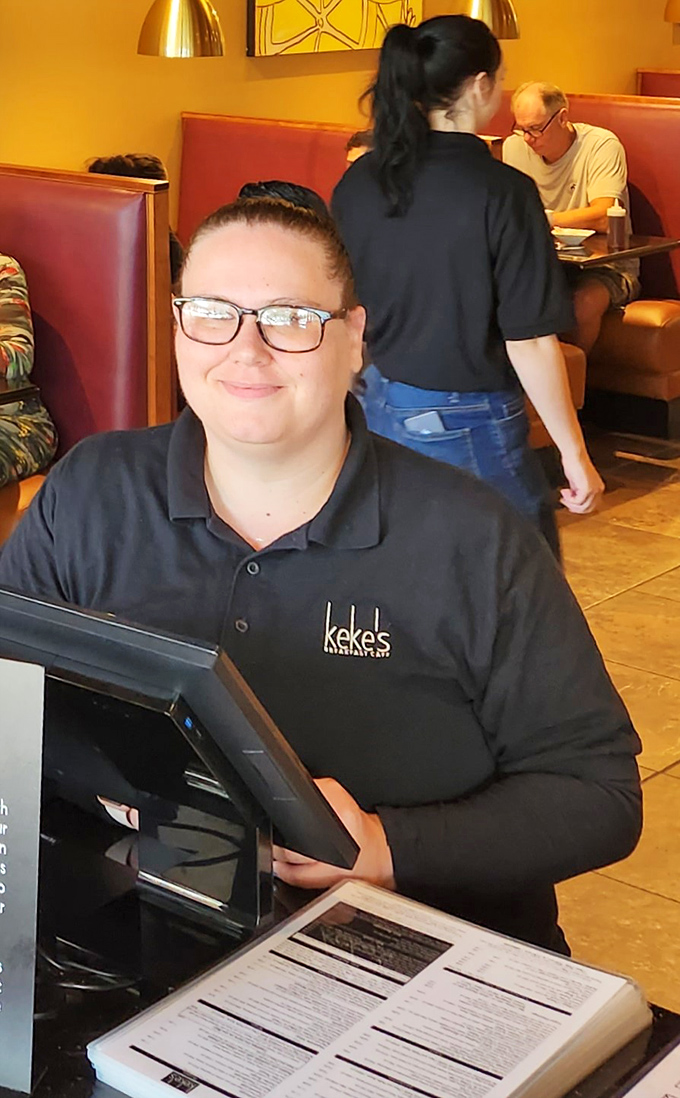 The face of breakfast hospitality, ready to guide you through your morning journey. These are the gatekeepers to pancake paradise.