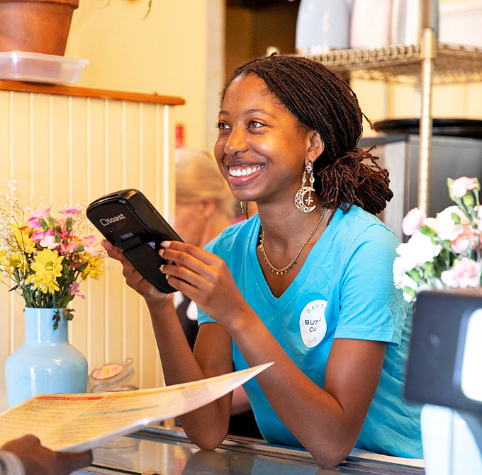 When your server smiles this genuinely, you know you've found a place where hospitality isn't just policy&mdash;it's personality.