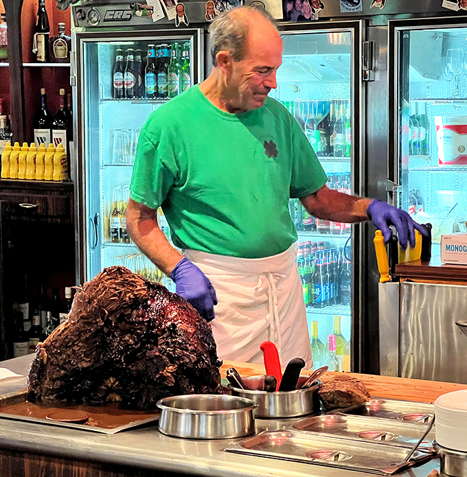 The maestro at work with his masterpiece&mdash;a glorious hunk of roast beef that will soon become the star of countless sandwiches.