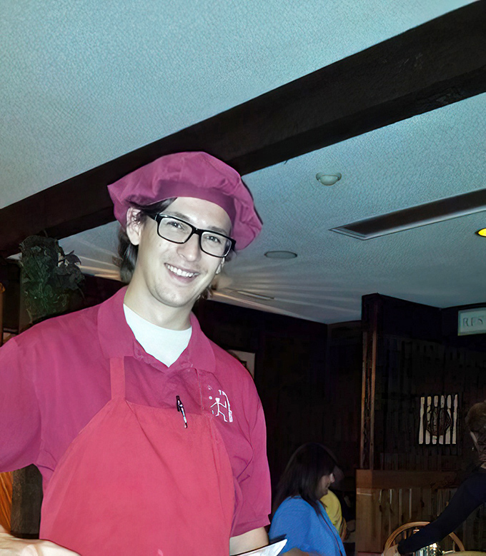 The staff wears their signature burgundy with pride. In the steak world, these are the professionals you want handling your beef destiny.