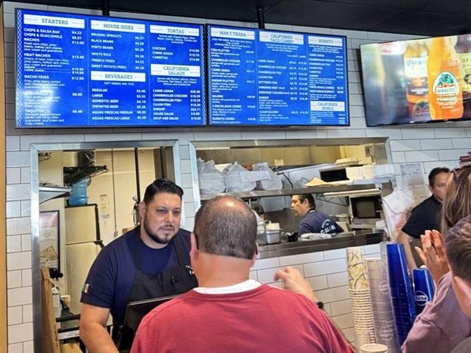 The kitchen crew works their magic behind the scenes, orchestrating a symphony of flavors that keeps the dining room humming.