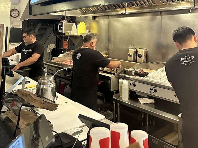 Masters of their craft at work. These aren't just cooks &ndash; they're artists whose medium happens to be perfectly seasoned ribeye.